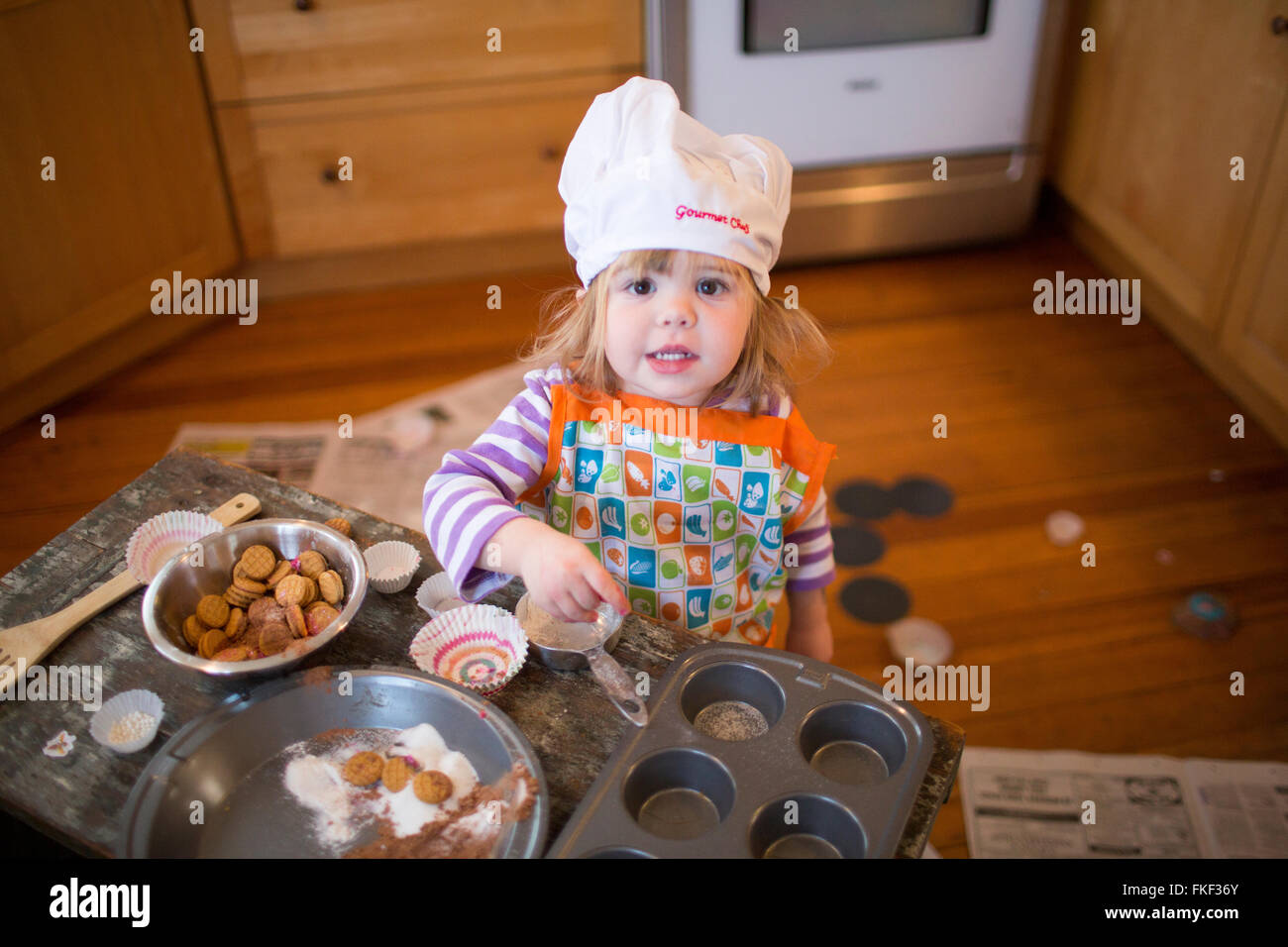 Little chef cooking in the kitchen Stock Photo - Alamy
