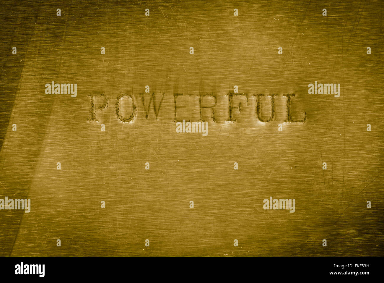 word powerful printed on golden metallic background texture Stock Photo ...