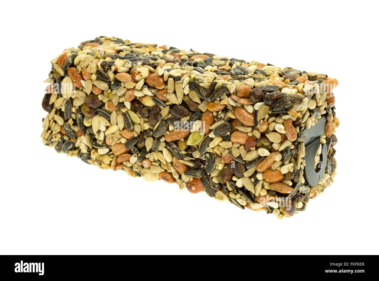 A birdseed block isolated on a white background Stock Photo - Alamy