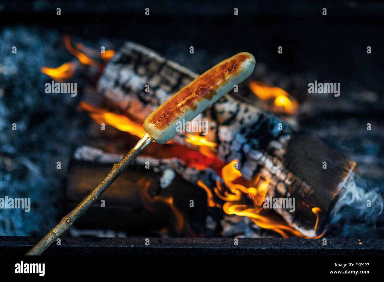 Cooking sausages on grill wood hi-res stock photography and images - Alamy