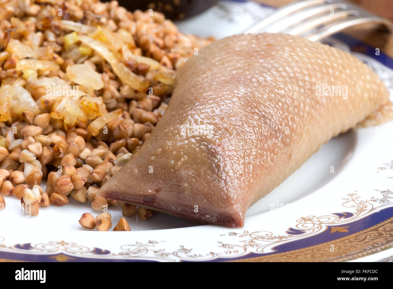 Skin of chicken neck or gooseneck, filled with chicken liver, onion ...