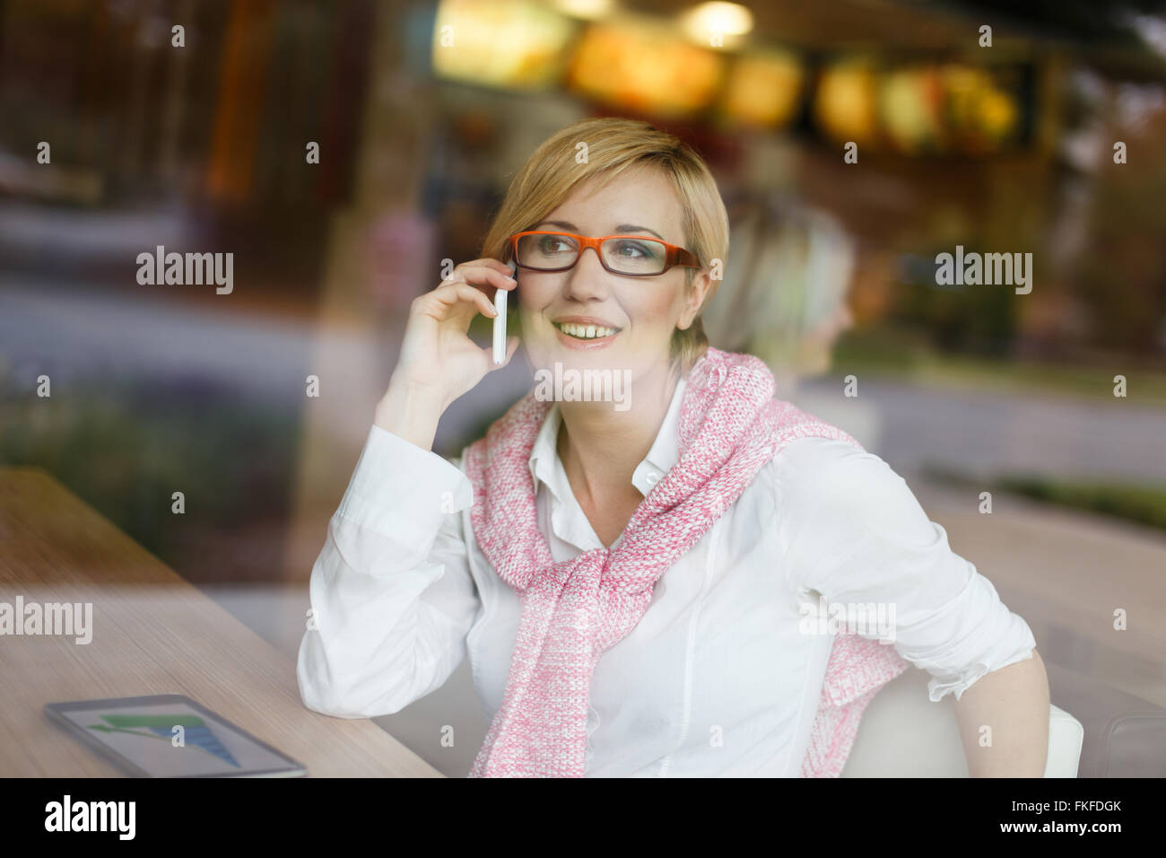 Happy young manager call by smartphone in restaurant Stock Photo - Alamy