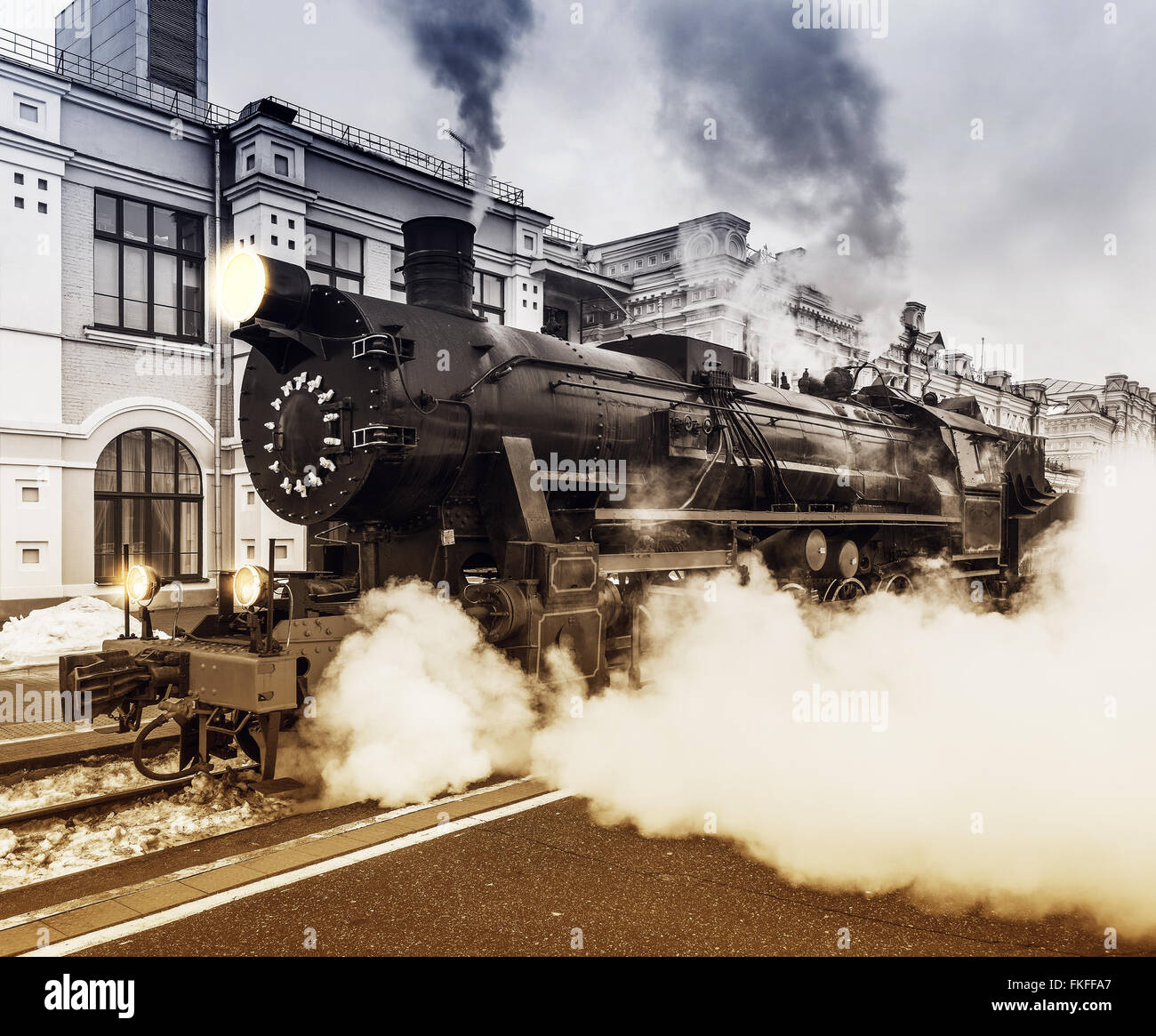 Departure of the retro steam train at spring evening time Stock Photo ...
