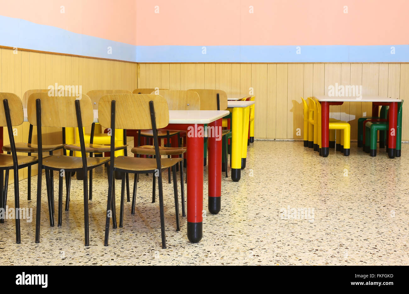 large nursery lunchroom with small chairs and small dining table Stock ...
