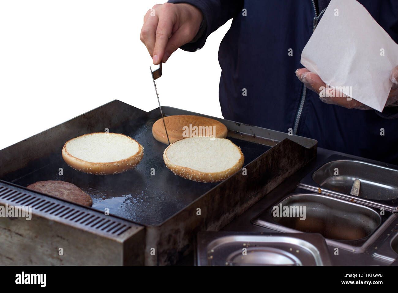 Man making and hamburger isolated on white Stock Photo - Alamy