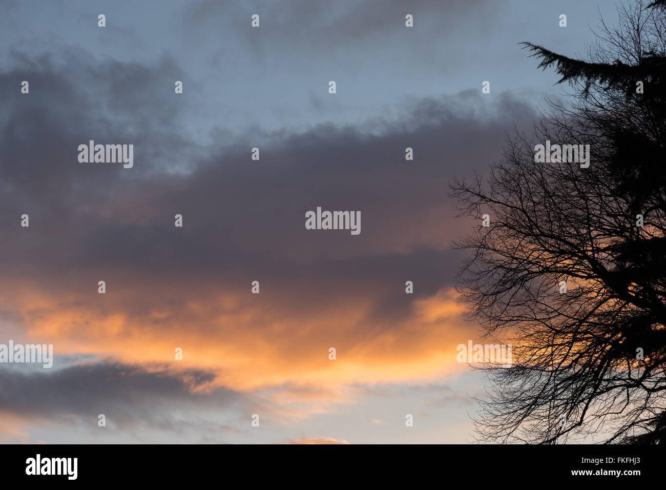 A beautifully mixed sunset of low and high cloud causing contrast Stock ...