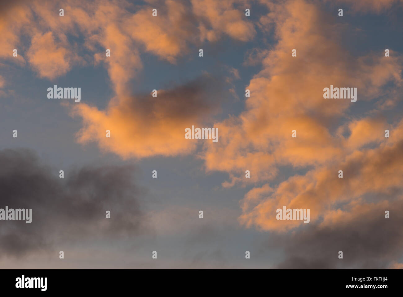 A beautifully mixed sunset of low and high cloud causing contrast Stock ...
