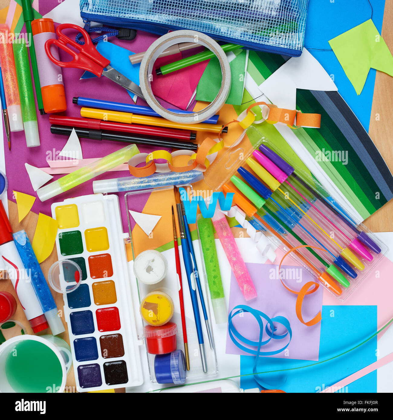 artwork workplace with creative accessories, art tools for painting and ...