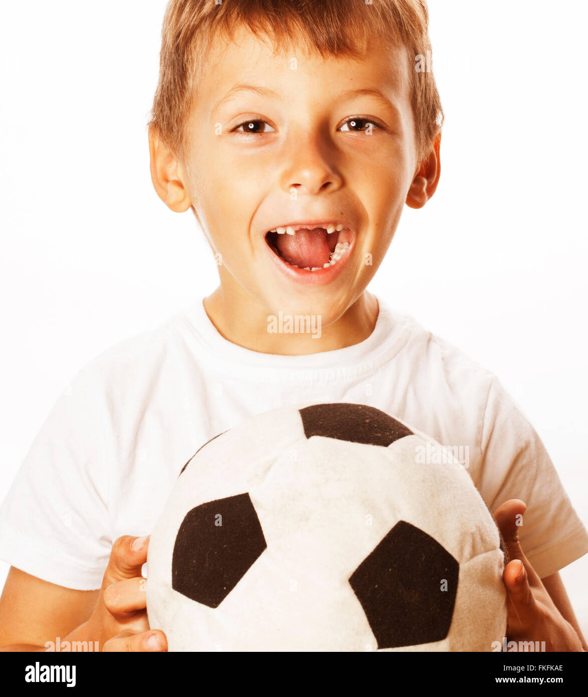 little cute boy playing football ball isolated on white close up ...