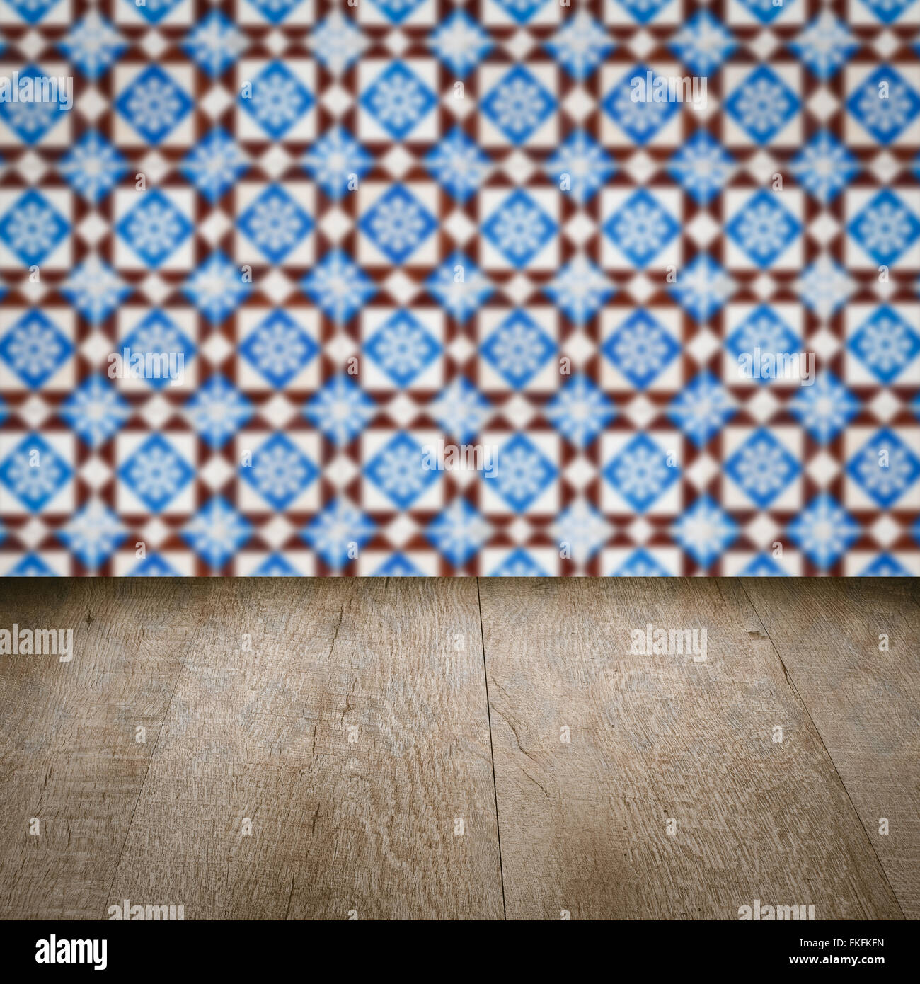 Empty wood table top and blur vintage ceramic tile pattern wall in ...
