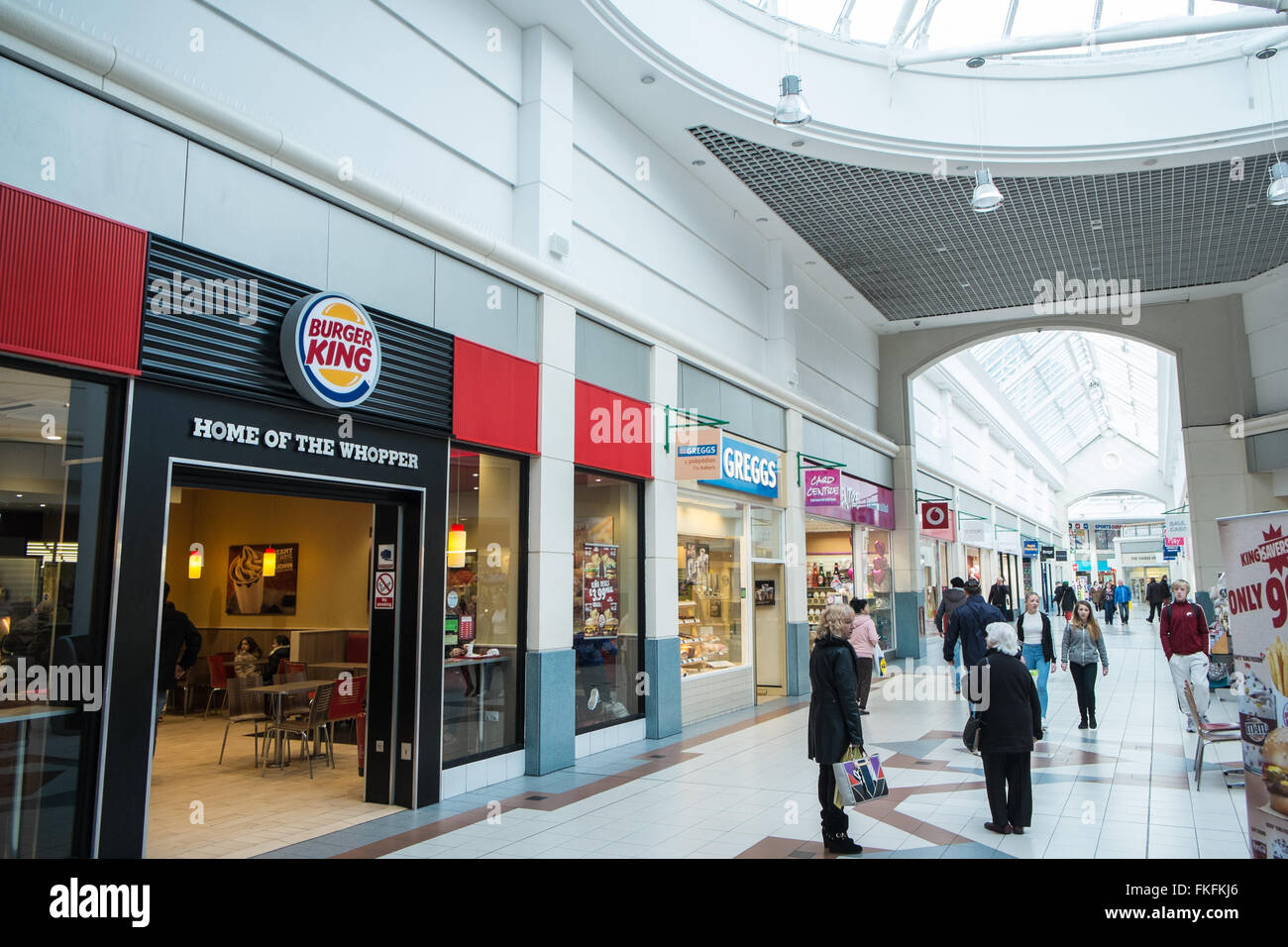 Covered market shopping mall area zone with Greggs,Burger King shop ...