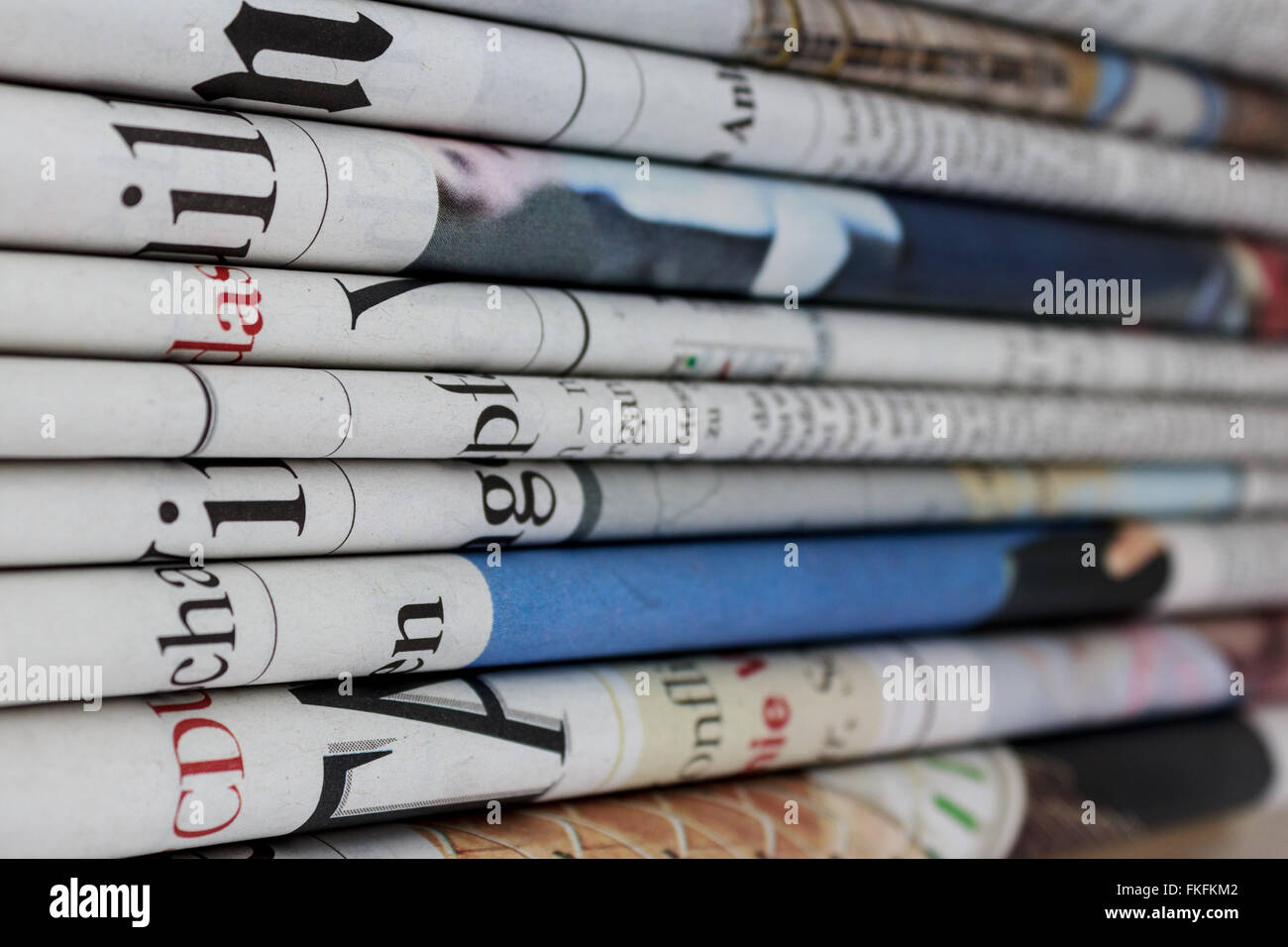 Pile of newspapers, stack of newspaper Stock Photo - Alamy