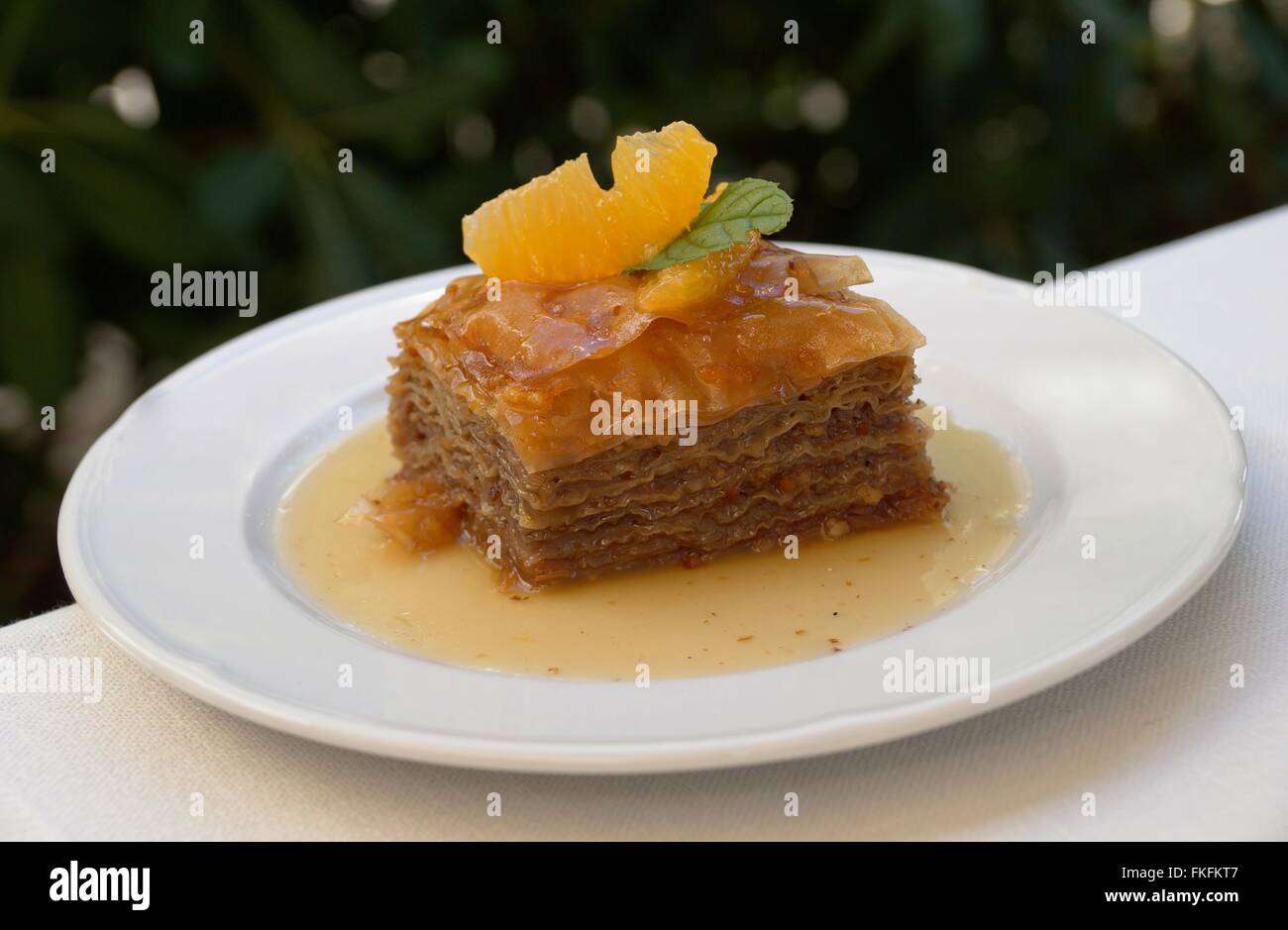 Flaky nut baklava with orange syrup Stock Photo - Alamy