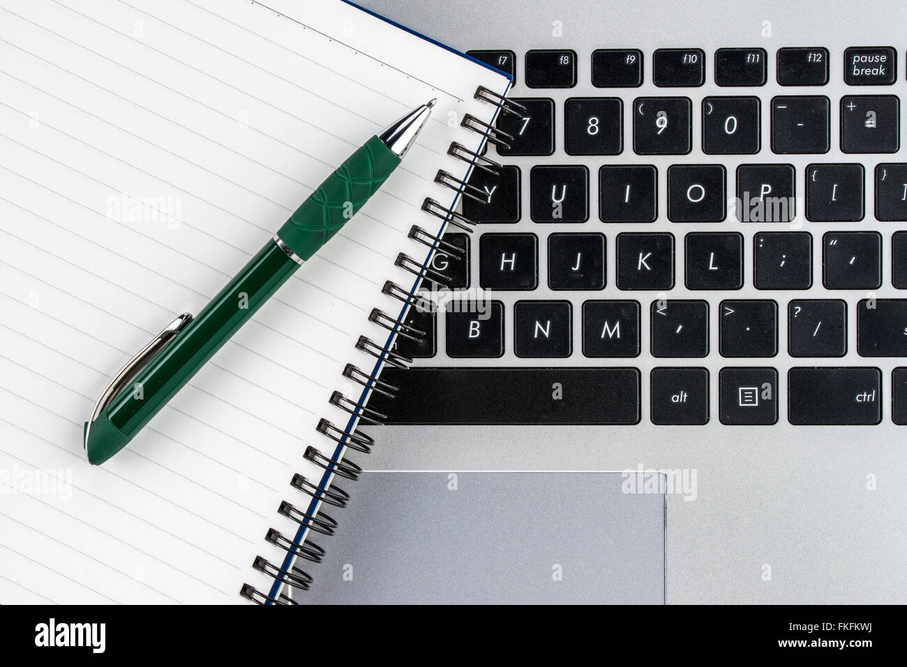 notebook and pen on the laptop keyboard, meeting, close up Stock Photo ...