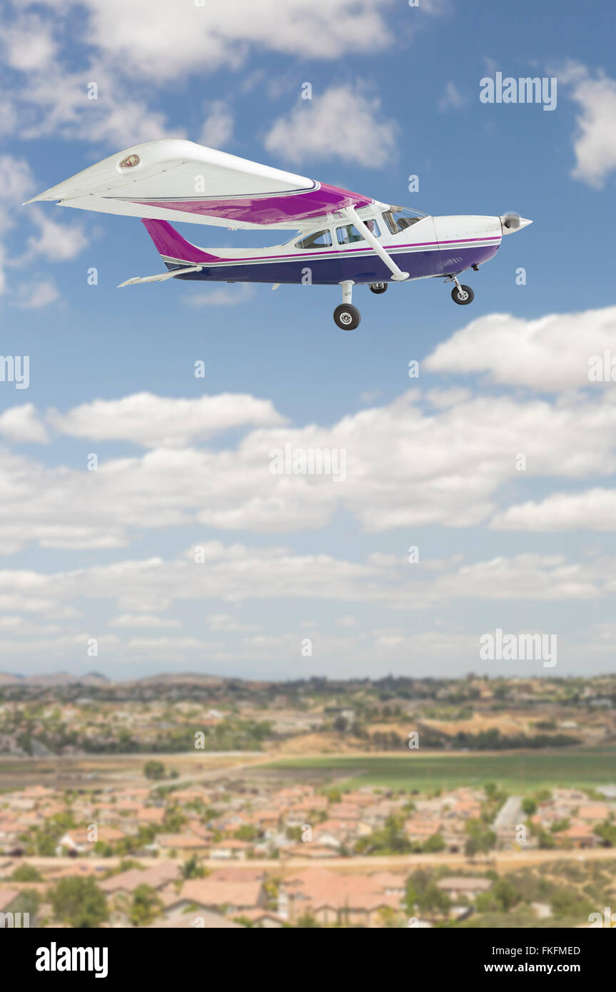 The Cessna 172 Single Propeller Airplane Flying In The Sky Stock Photo ...