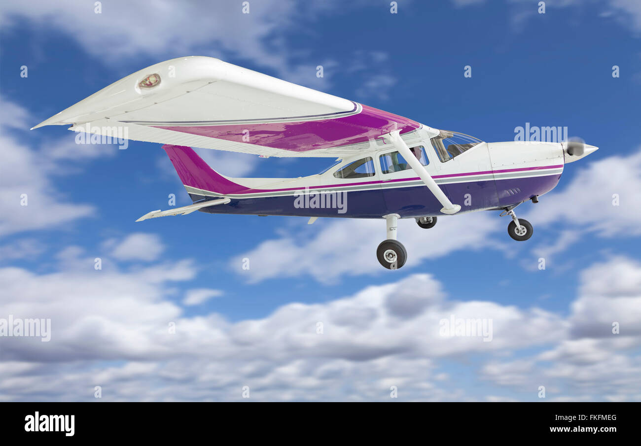 The Cessna 172 Single Propeller Airplane Flying In The Sky Stock Photo ...