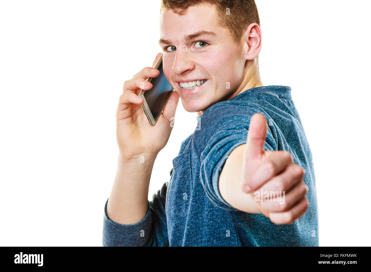 Technology and communication. Young man casual style talking on mobile ...