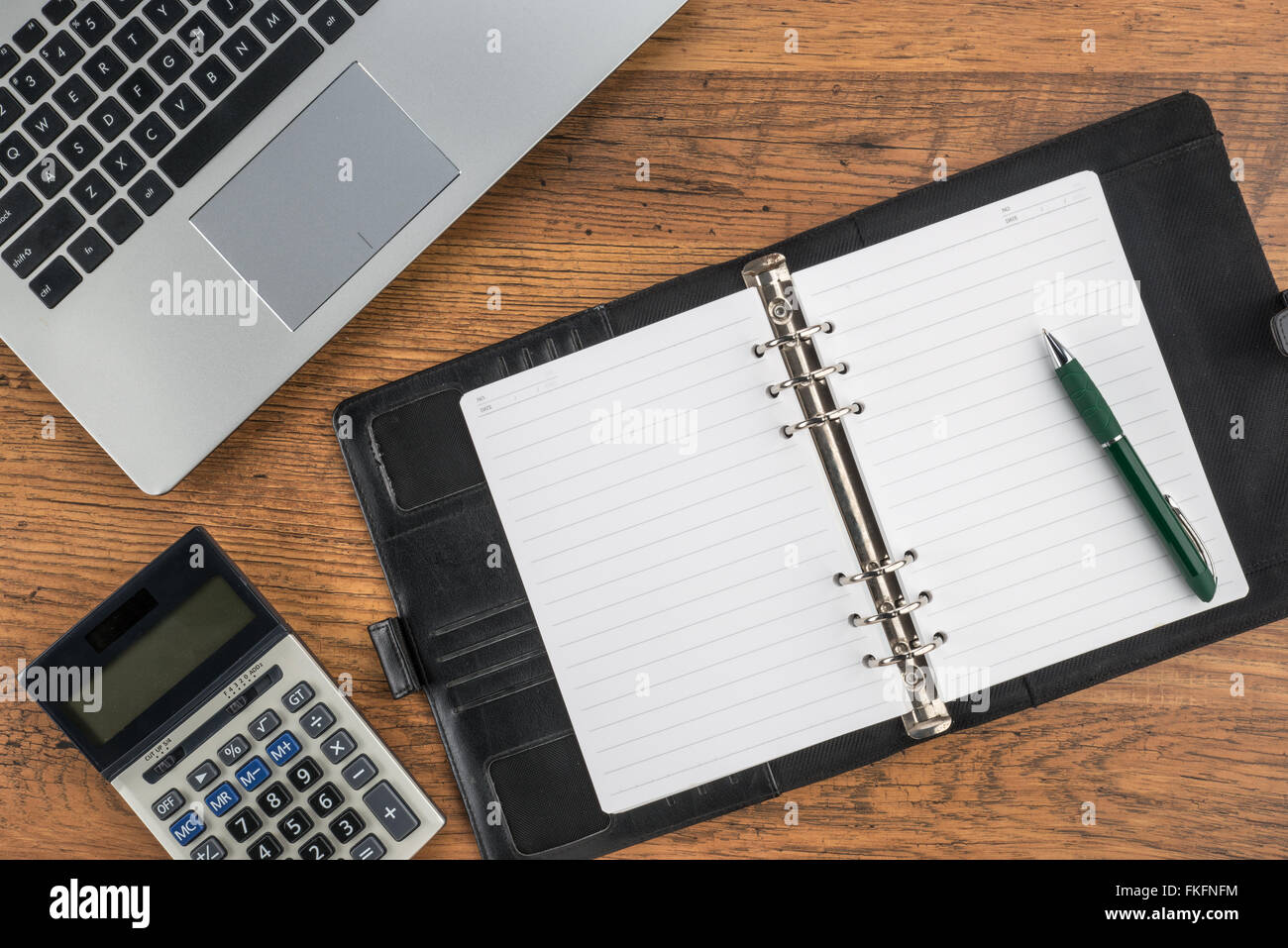 notebook and pen with calculator on the desk finance plan Stock Photo ...