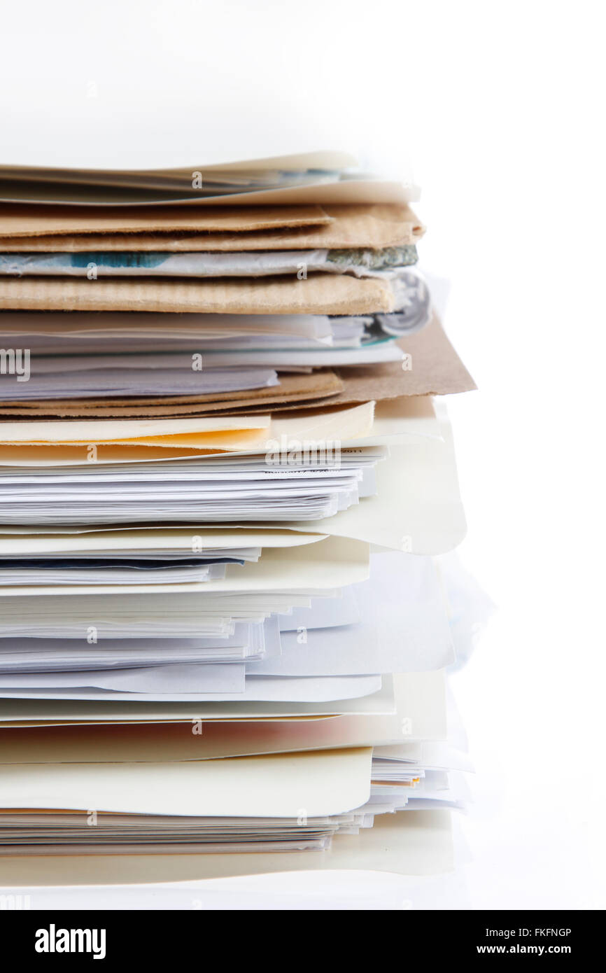 Pile of files on plain background Stock Photo - Alamy
