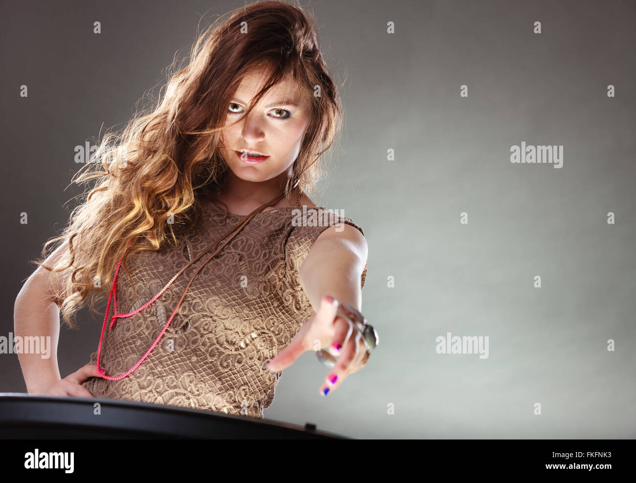 Portrait of mysterious enigmatic woman. Young intriguing attractive ...