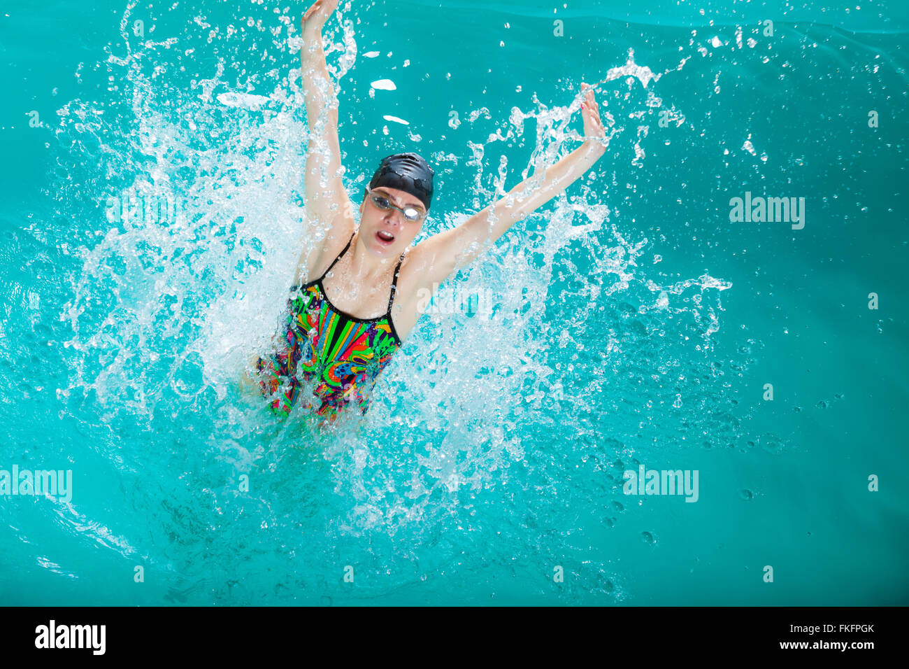 Swimming. Competition and recreation. Woman swimmer victory jump ...
