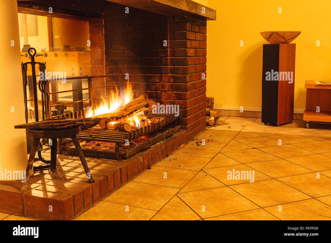 Burning fire wood in fireplace. Home interior indoor Stock Photo - Alamy