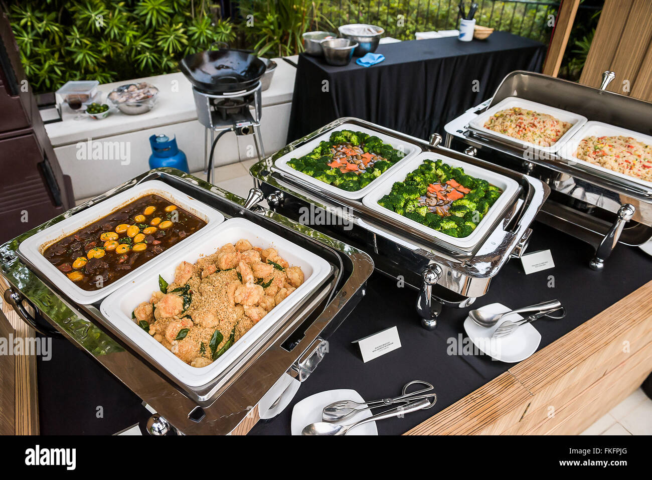 Delicious Asian cuisine buffet with seafood and vegetable dishes Stock ...