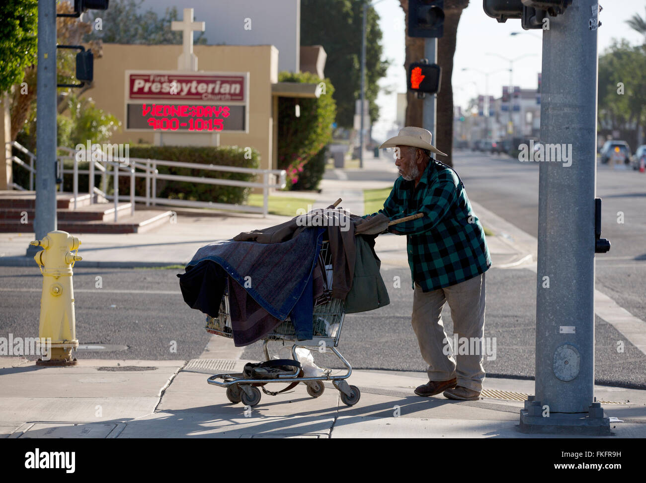 Homeless man pushing shopping cart hi-res stock photography and images ...
