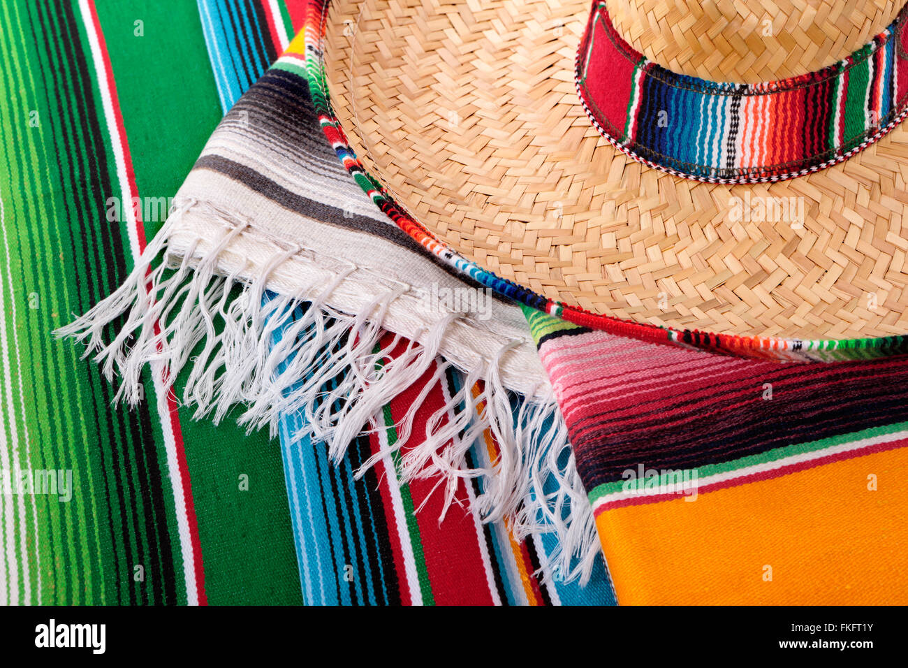 Traditional Mexican serape blankets or rugs with sombrero Stock Photo ...