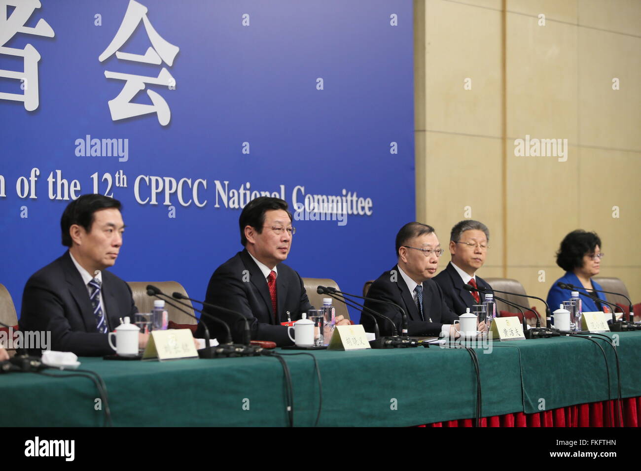 Beijing, China. 9th Mar, 2016. Huang Jiefu (C), Fan Xiaojian (2nd R ...