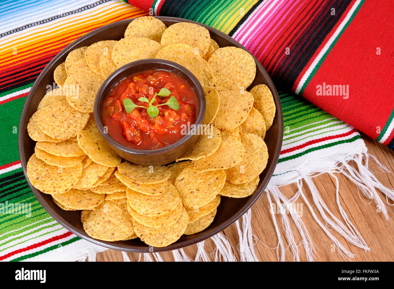 Mexican traditional serape blankets with salsa dip and tortilla chips ...