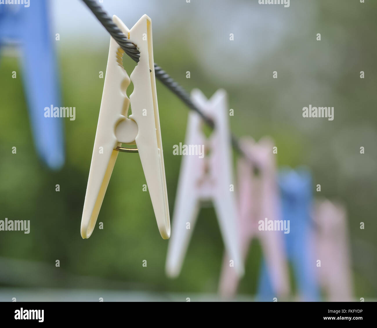 Clothes line with pegs hi-res stock photography and images - Alamy