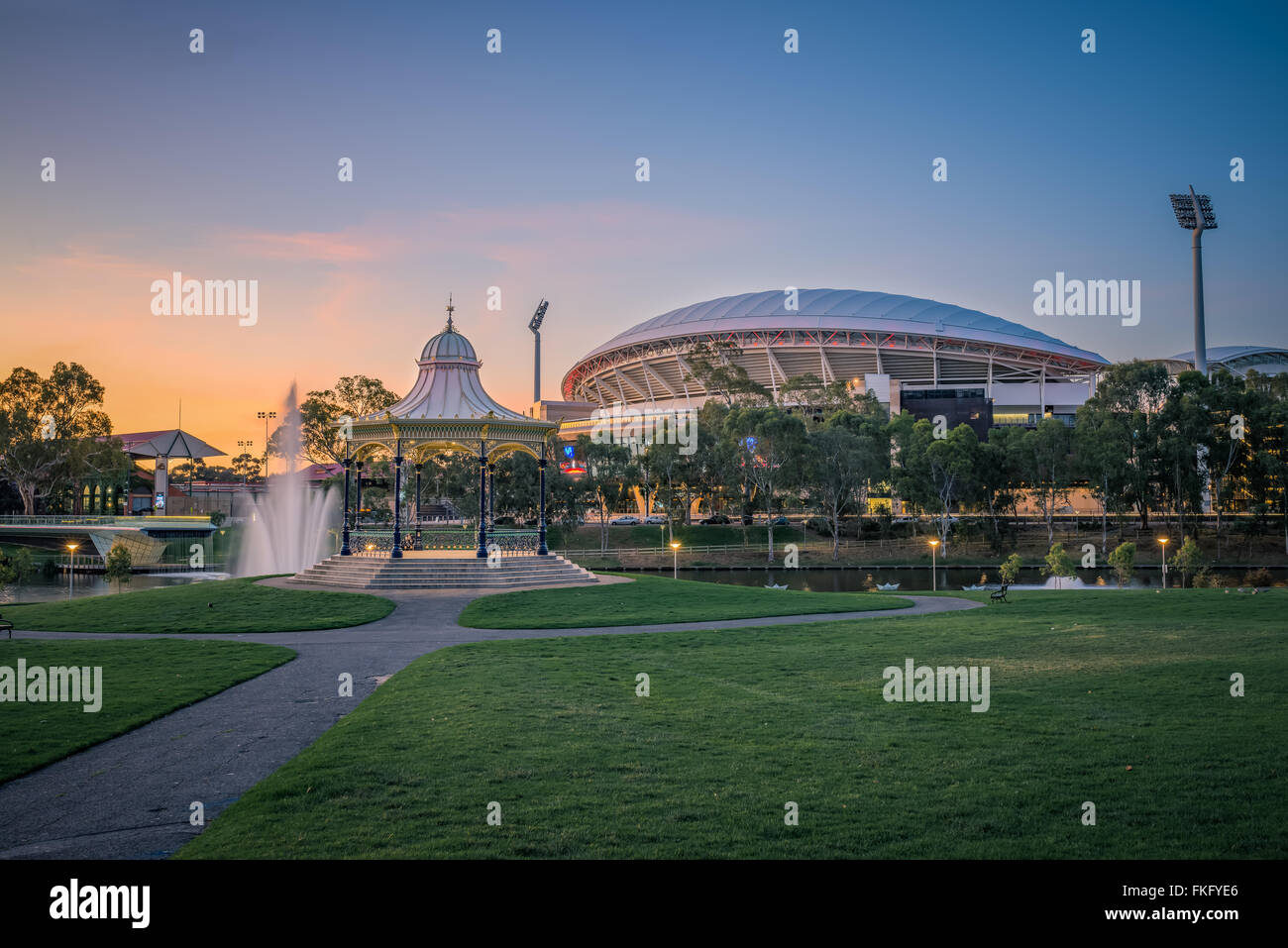 Sunset in Adelaide's Riverbank Precinct featuring the ornate Elder Park ...