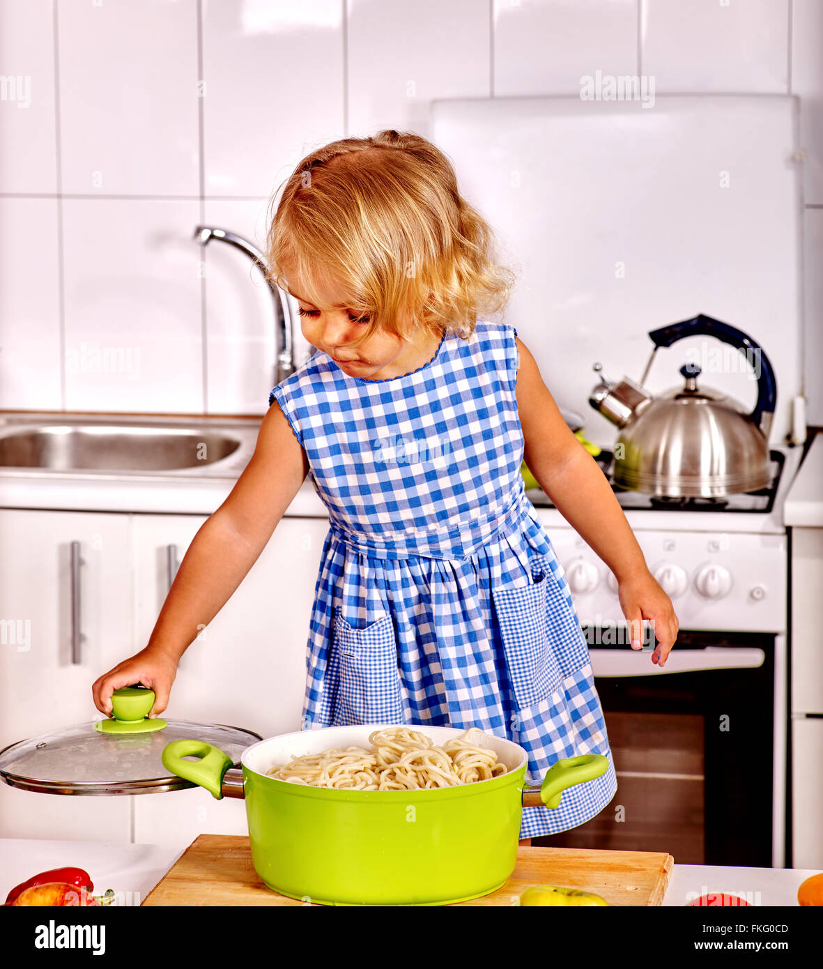 Child cooking at kitchen Stock Photo - Alamy