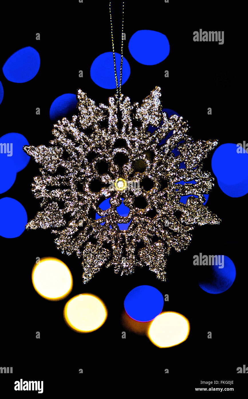 Xmas tree bauble with bokeh lights Stock Photo - Alamy