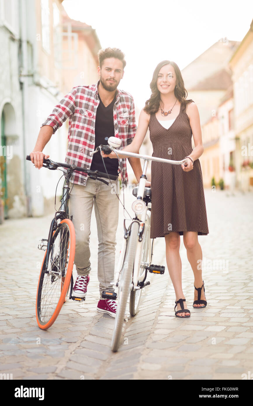 Romantic couple with bicycle hi-res stock photography and images - Alamy