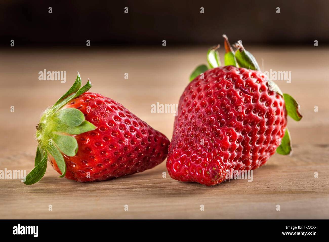 Natural sliced ripe strawberries hi-res stock photography and images ...