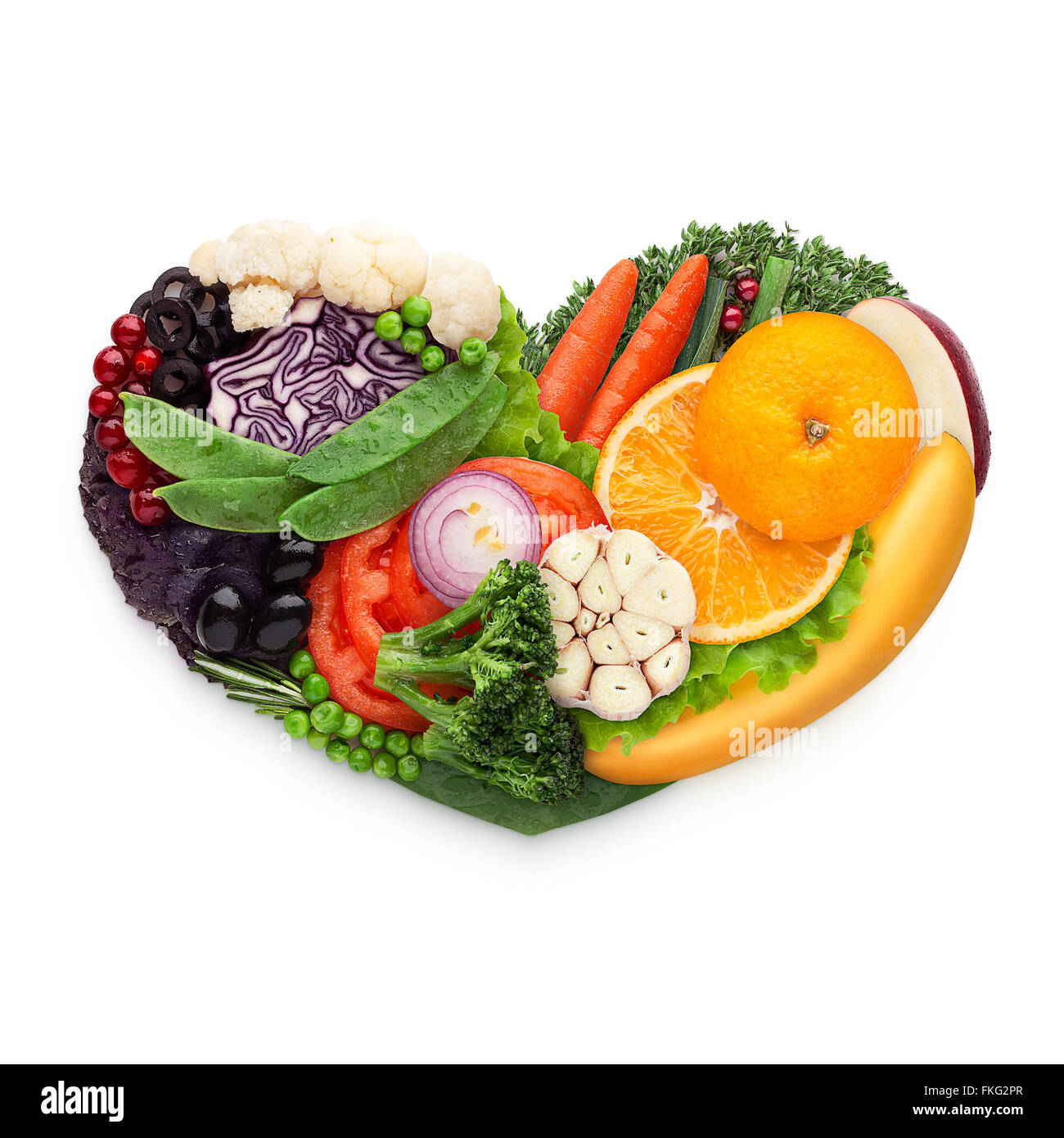 Healthy food concept of a human heart made of vegetable and fruit mix ...