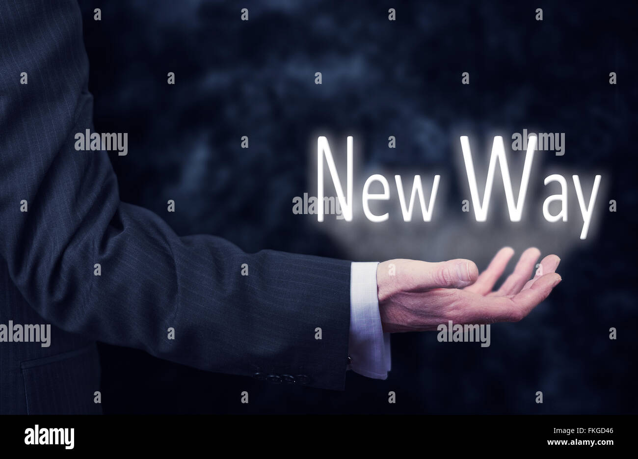 Businessman pressing an New Way concept button Stock Photo - Alamy