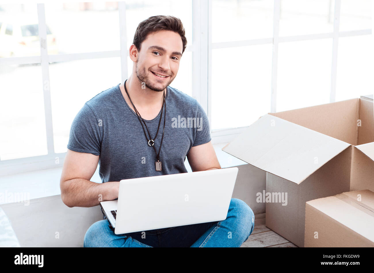 Man moving to new home Stock Photo - Alamy