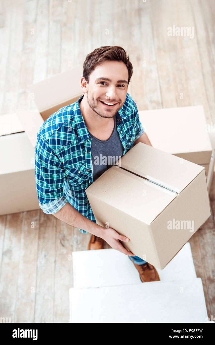 Man moving to new home Stock Photo - Alamy