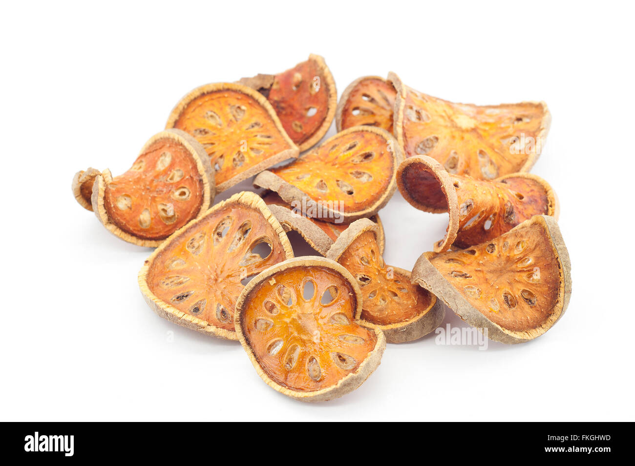 Dried Bael fruit, Thai style food preservation isolated on white ...