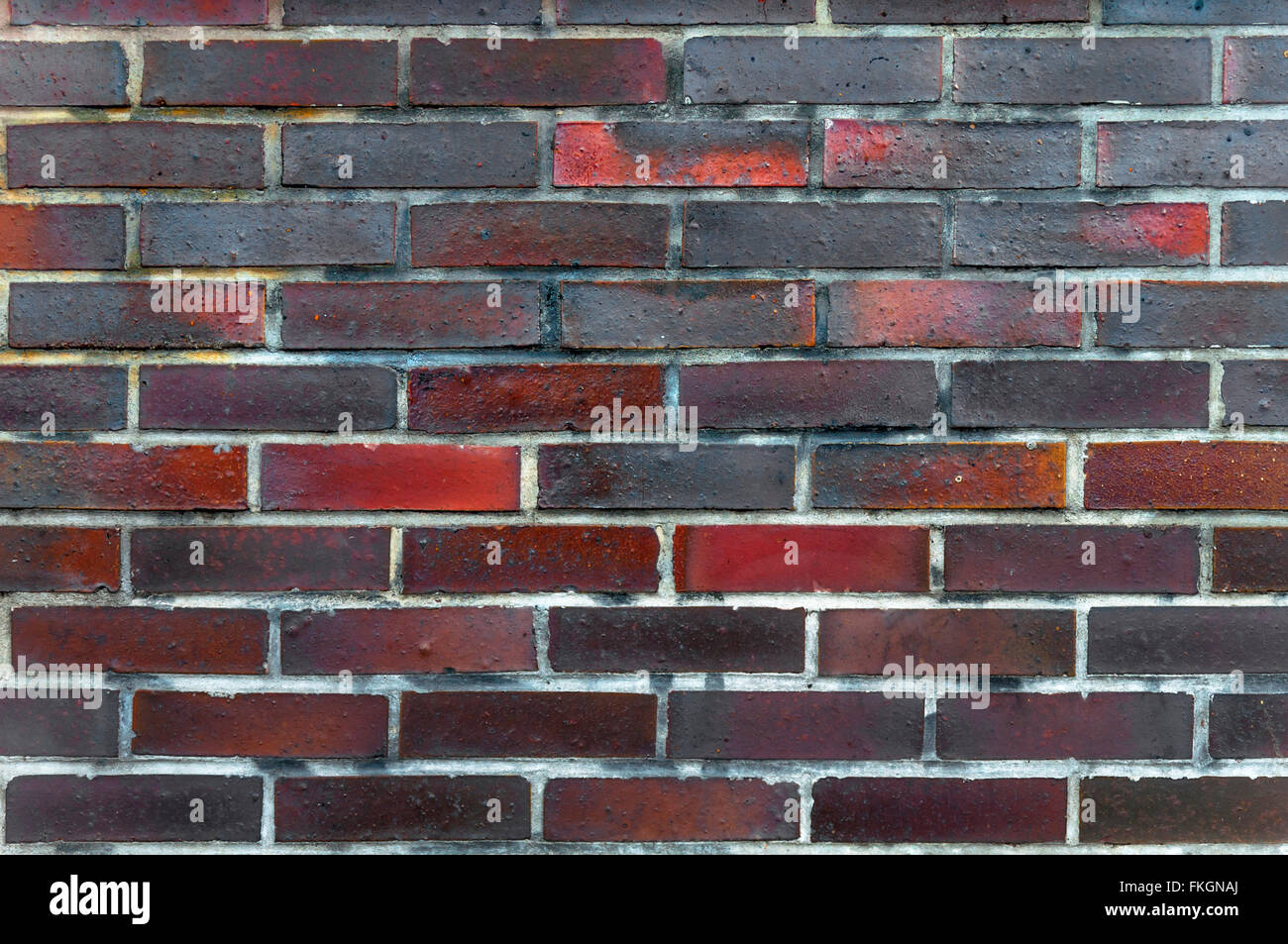 Dark red brick wall Stock Photo - Alamy