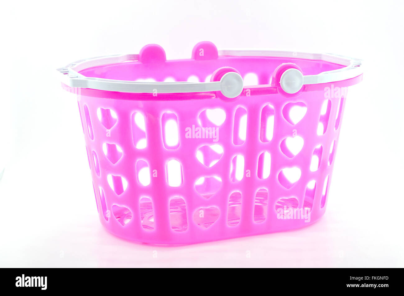Pink plastic basket isolated on white background Stock Photo - Alamy