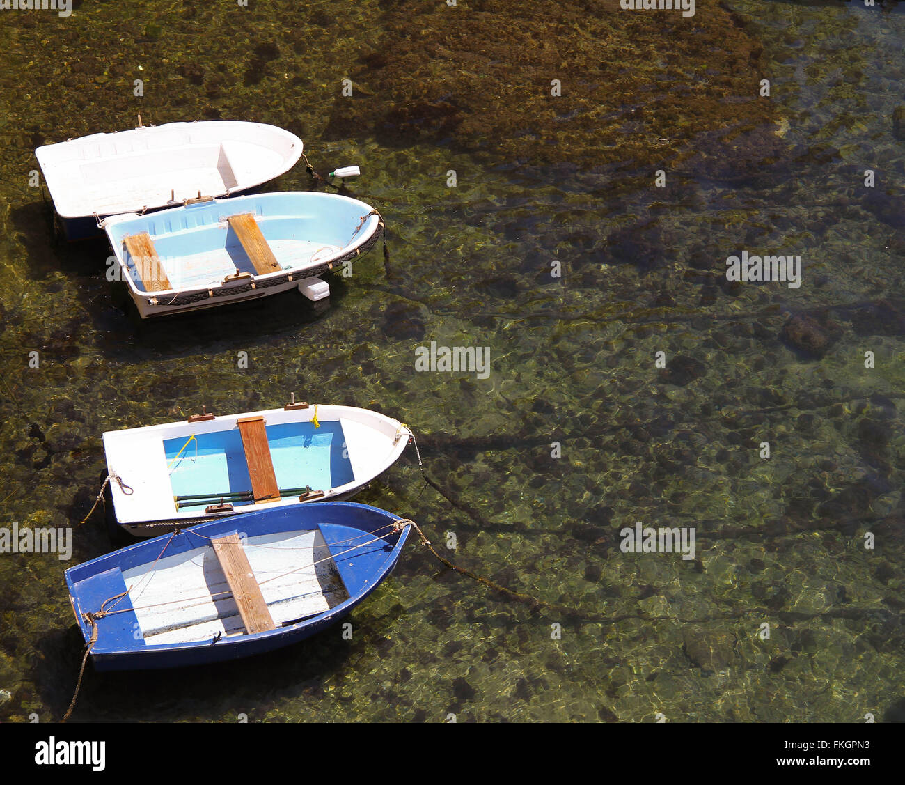 Row of fishing boats hi-res stock photography and images - Alamy