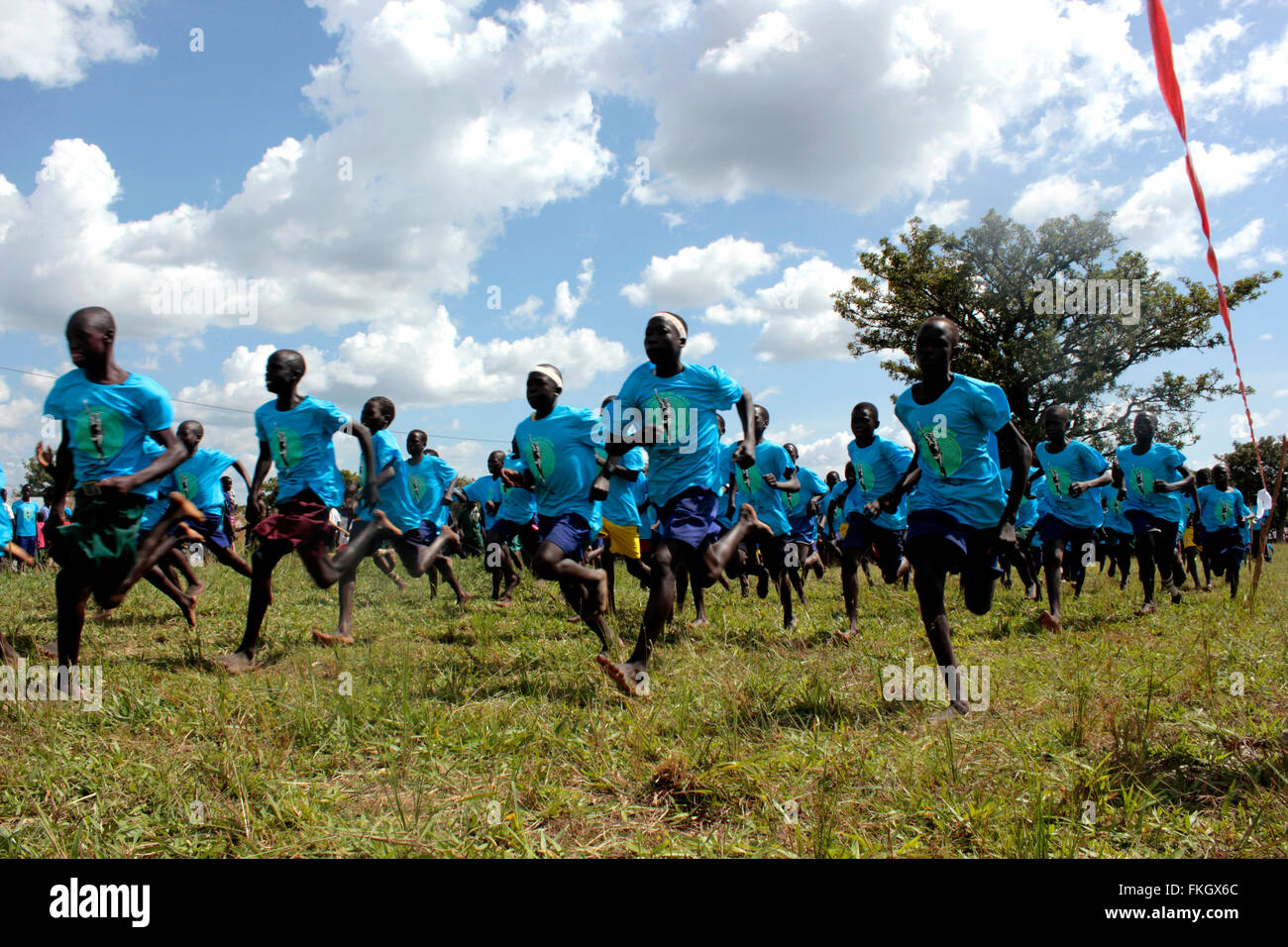 Children compete in a rucal community race in Uganda Stock Photo - Alamy