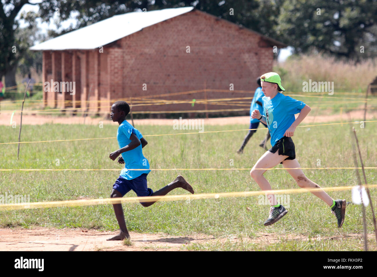 Boys compete in a rural community race in Uganda Stock Photo - Alamy
