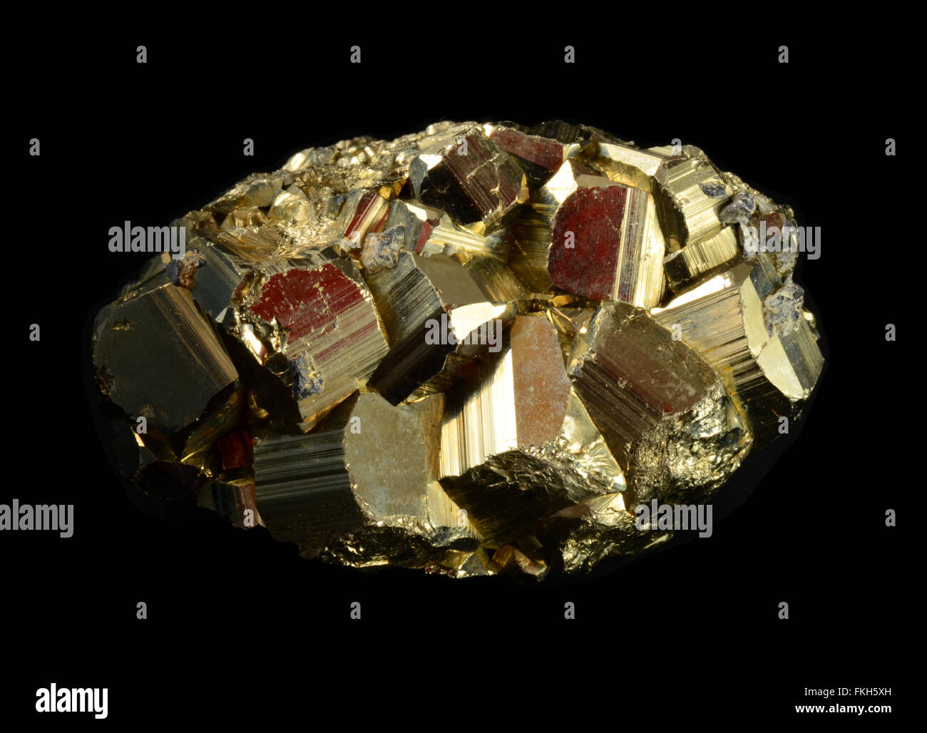 Cluster of pyrite crystals, isolated on black background Stock Photo ...