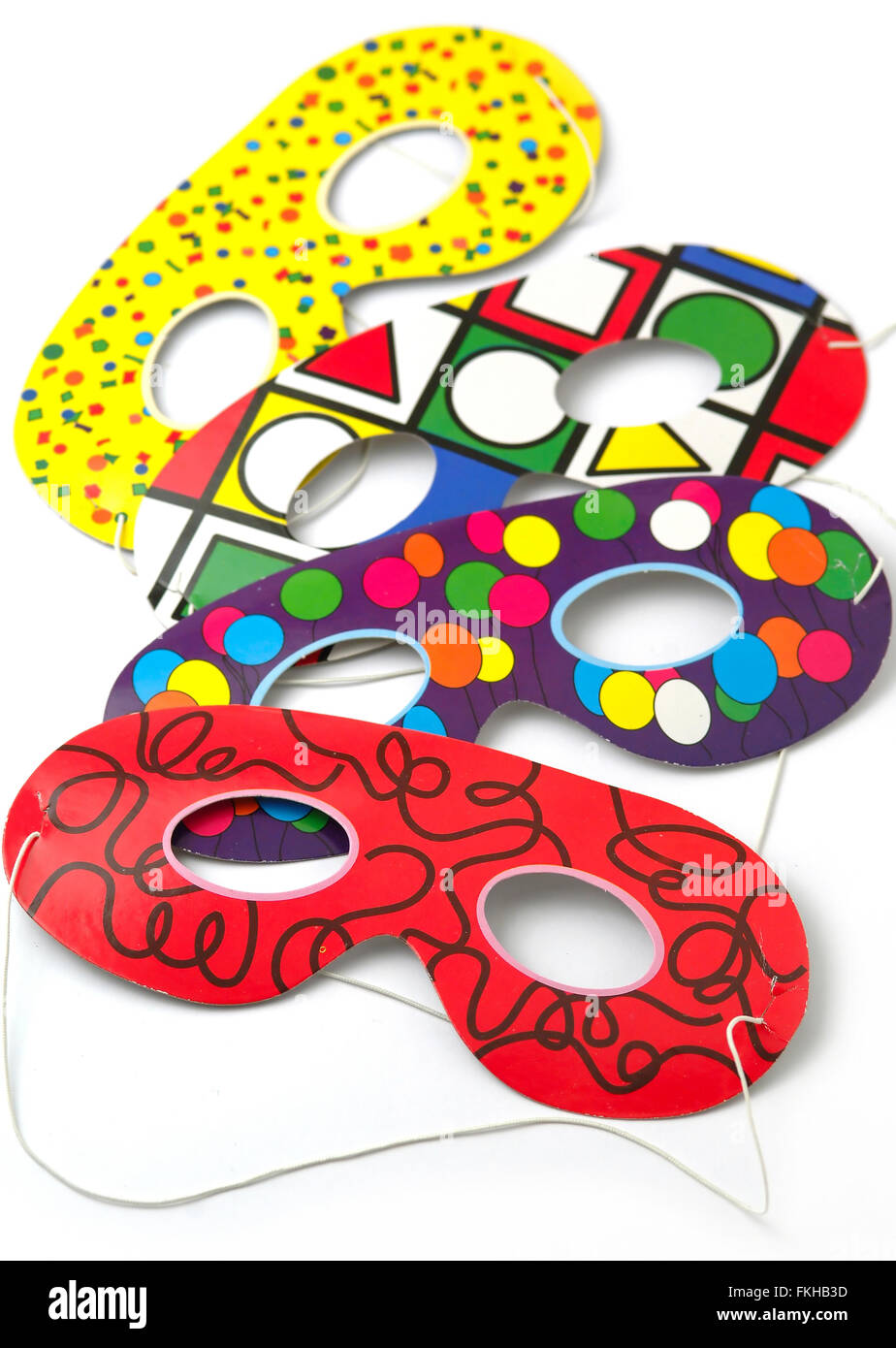 Colorful masks isolated on white Stock Photo - Alamy