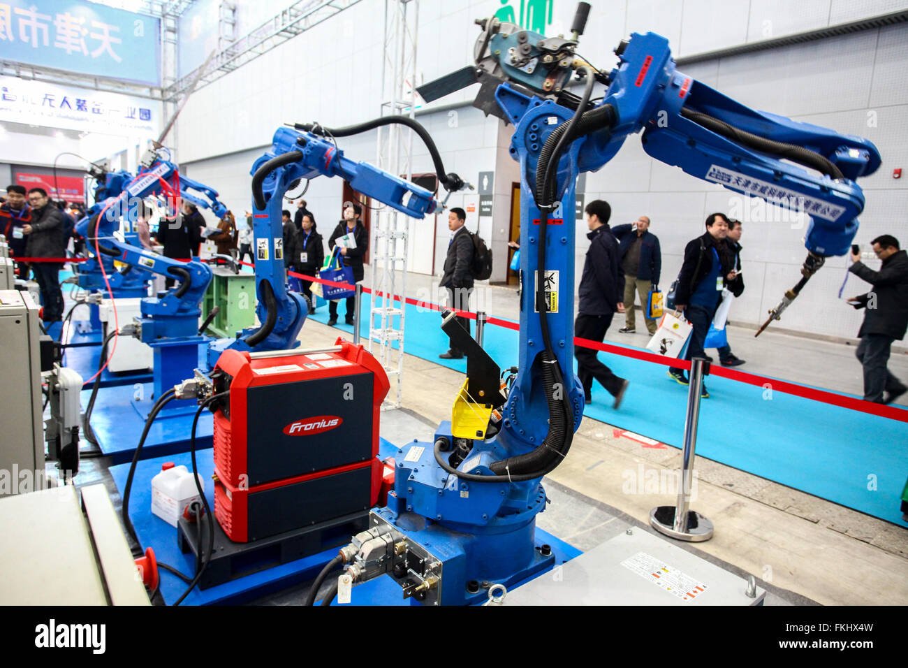 Tianjin, China. 9th Mar, 2016. Mechanical arms are programmed to dance ...